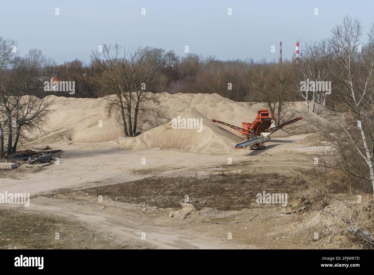 a machine working in a sand mine Stock Photo - Alamy
