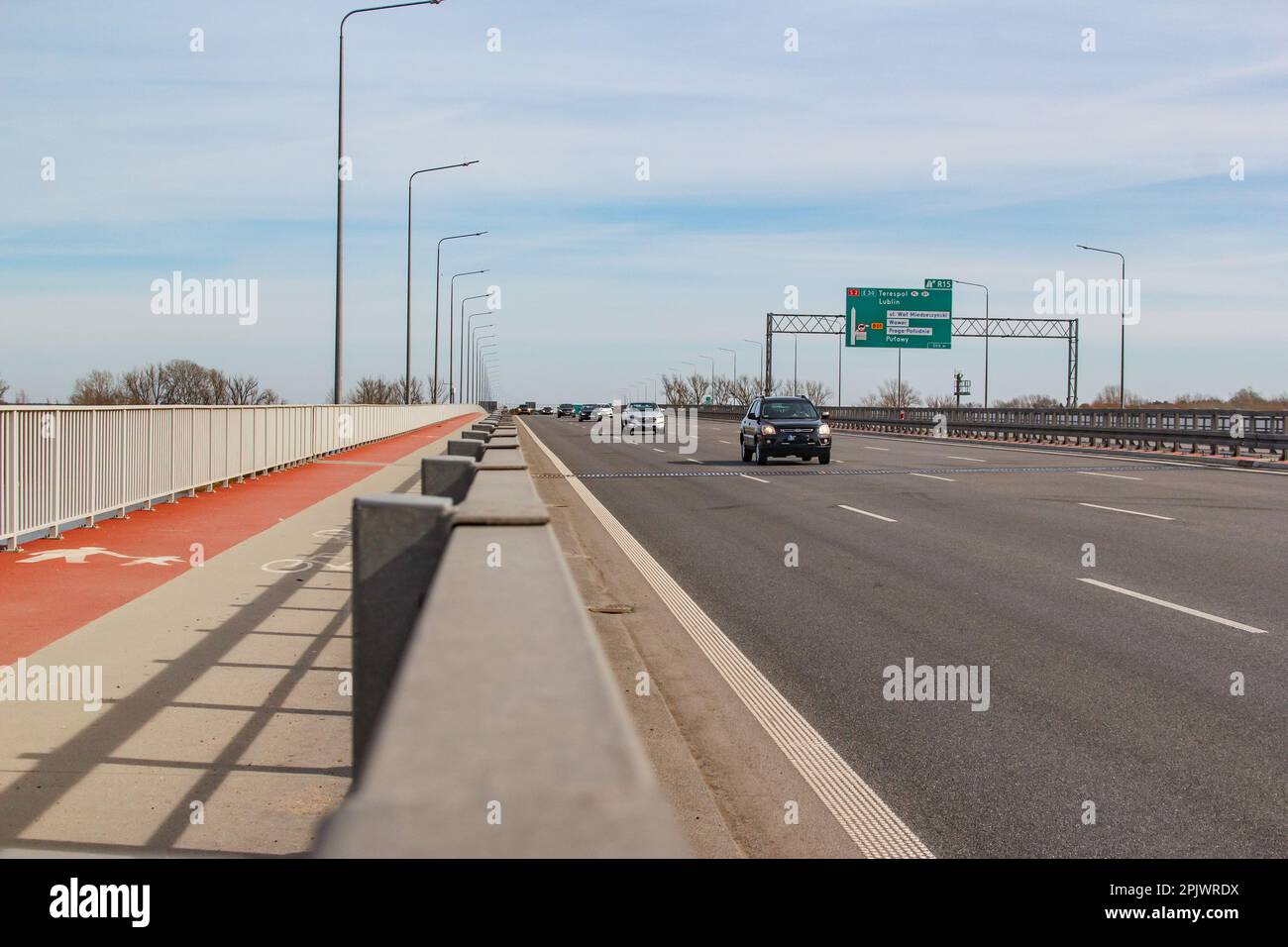 road signs and cars on a street - South Bridge, Warsaw, Poland Stock ...