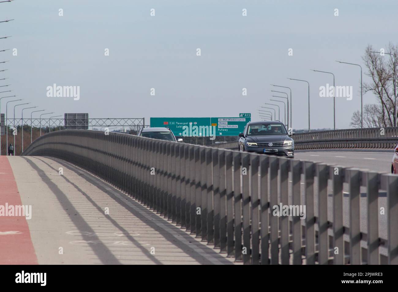road signs and cars on a street - South Bridge, Warsaw, Poland Stock ...