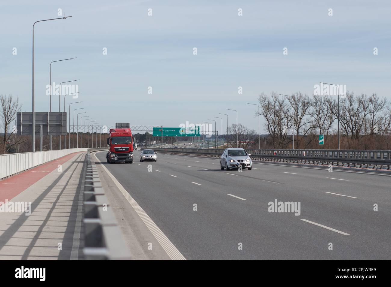 road signs and cars on a street - South Bridge, Warsaw, Poland Stock ...