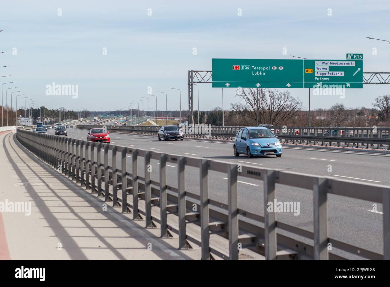 road signs and cars on a street - South Bridge, Warsaw, Poland Stock ...