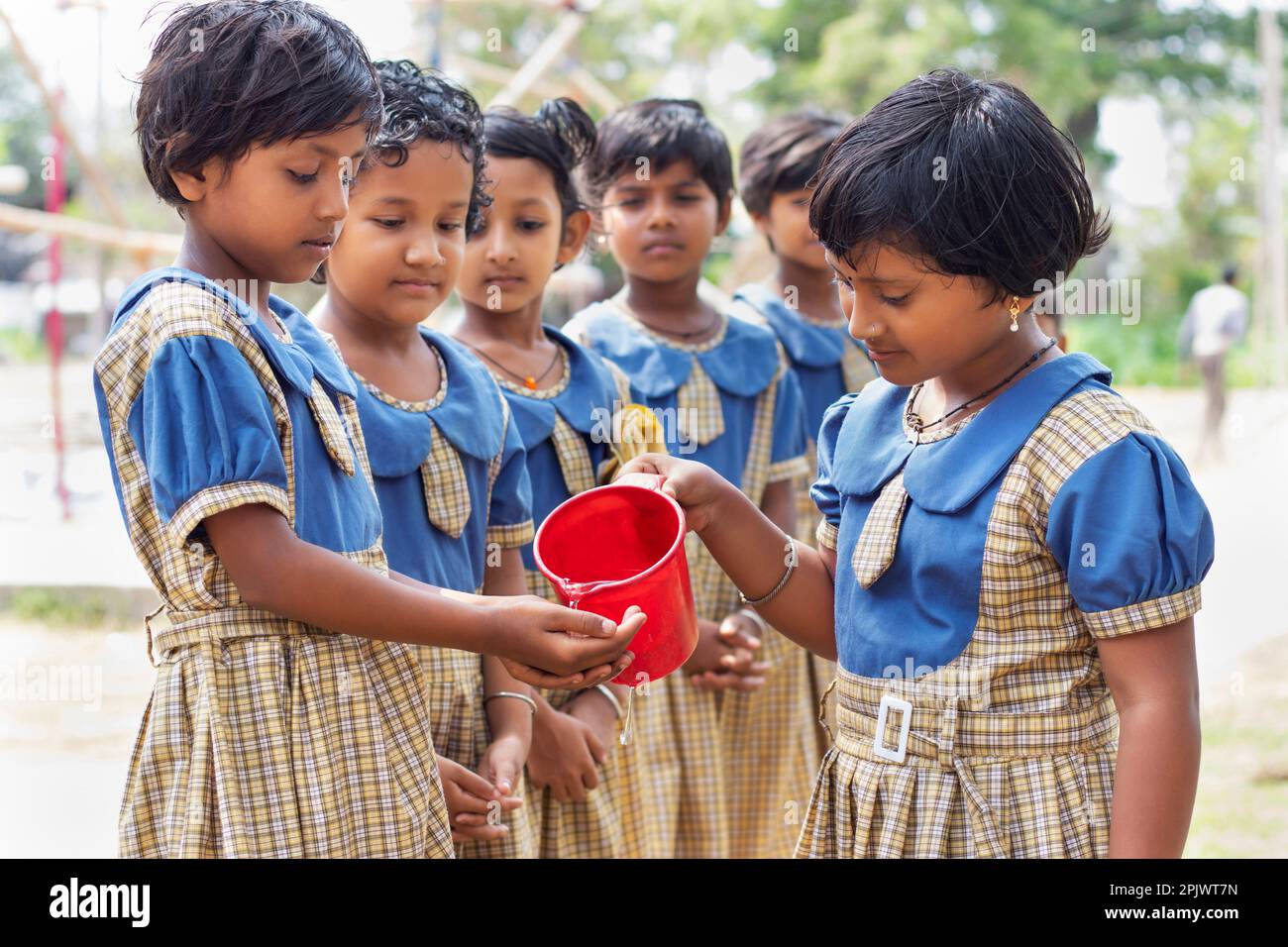 School students Eating after using hand wash at school Stock Photo - Alamy