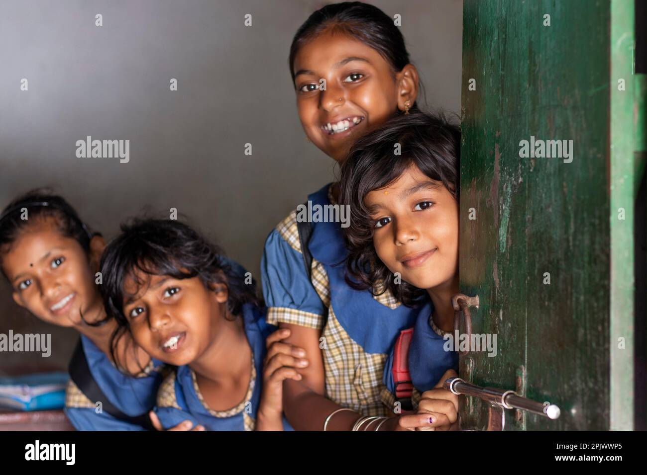 School Children's peeping from a classroom Stock Photo - Alamy