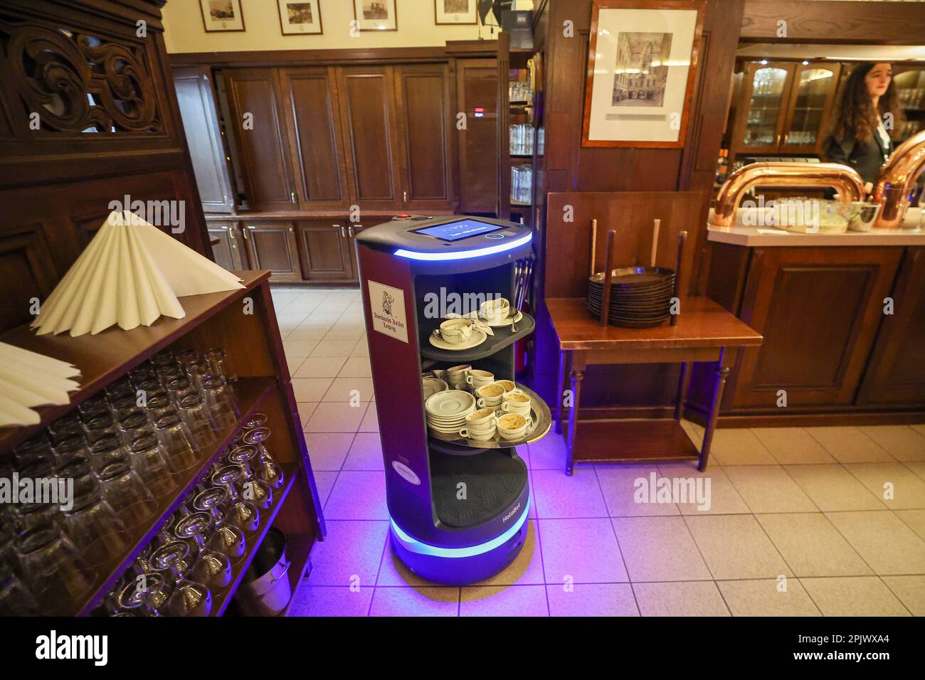 Leipzig, Germany. 04th Apr, 2023. A clearing robot brings dirty dishes ...