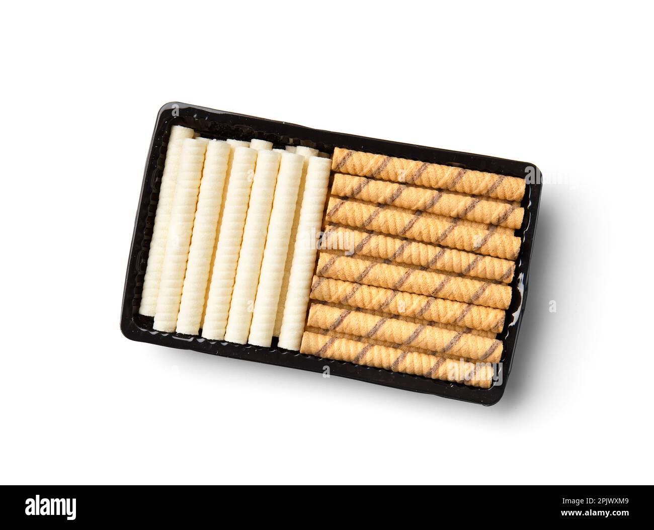 Chocolate and vanilla crunchy wafer rolls with cream filling in a ...