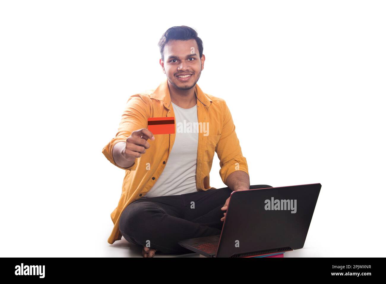 Young college student shopping online and showing credit card Stock ...