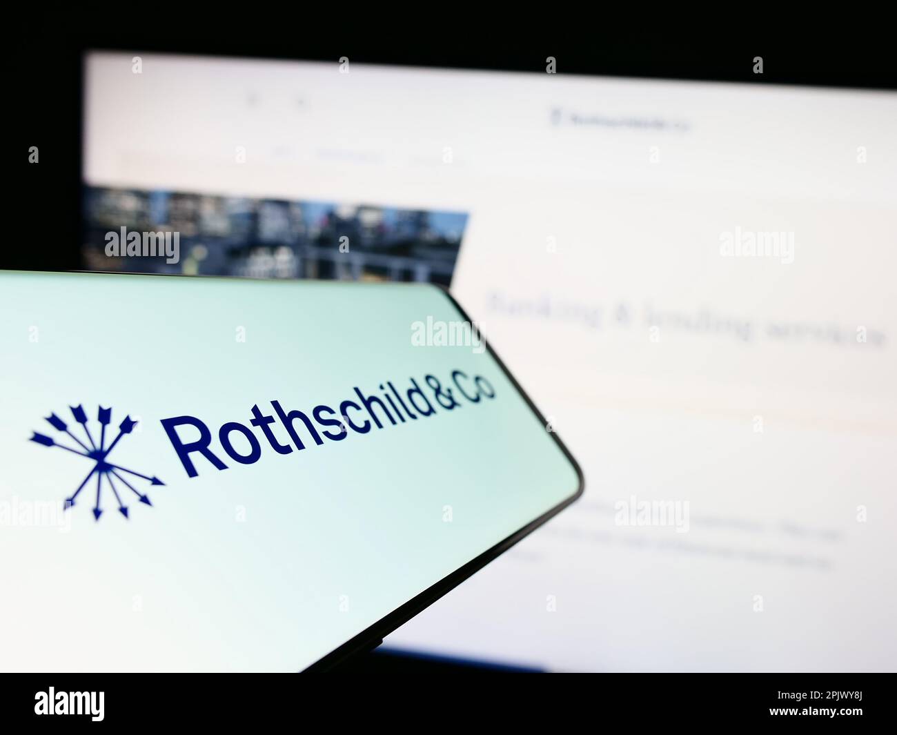 Cellphone with logo of financial services company Rothschild Co on ...