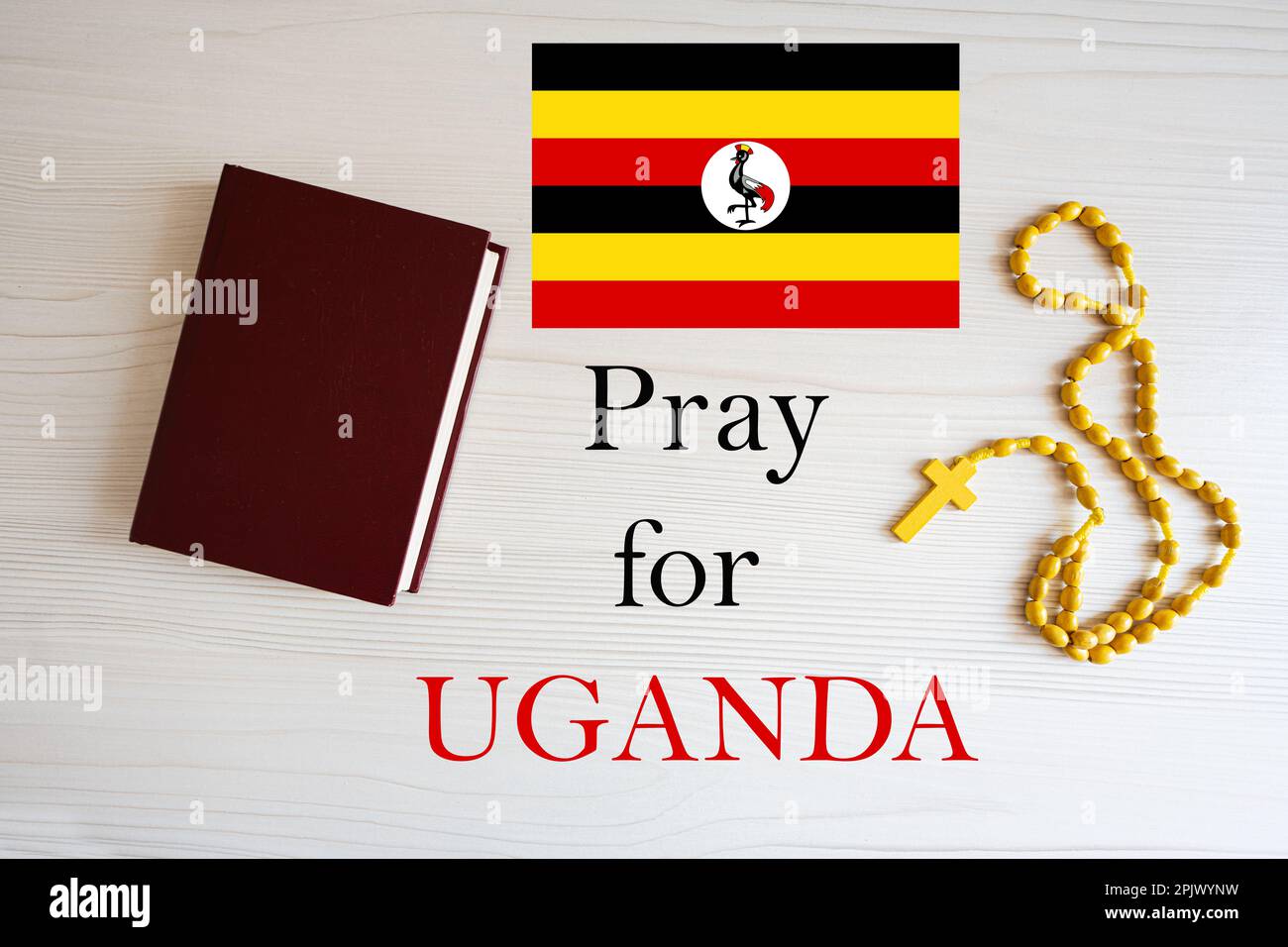 Pray for Uganda. Rosary and Holy Bible background Stock Photo - Alamy