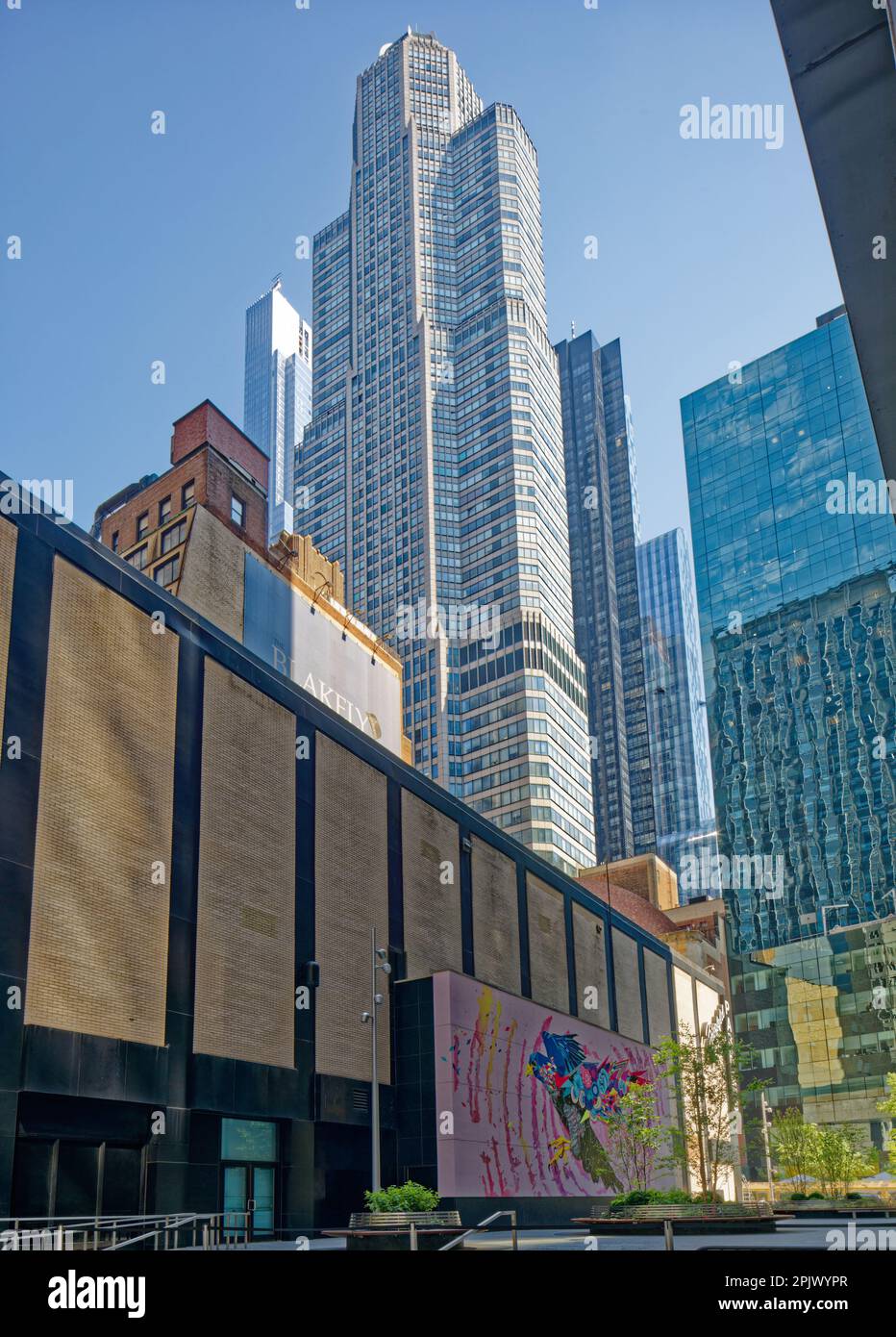 City Spire’s blue and white tower rises mid-block, viewed here from ...