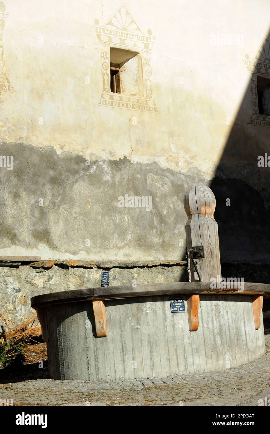 Public fountain in the village of Guarda, Engadin, Switzerland Stock ...