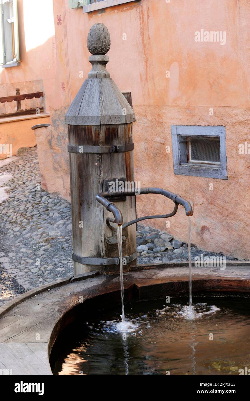 Public fountain in the village of Guarda, Engadin, Switzerland Stock ...