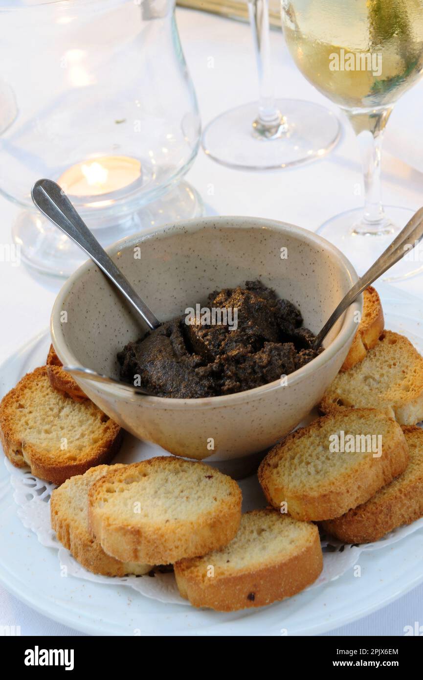 Tapenade and crostini, a typical appetizer of Provence, France Stock ...