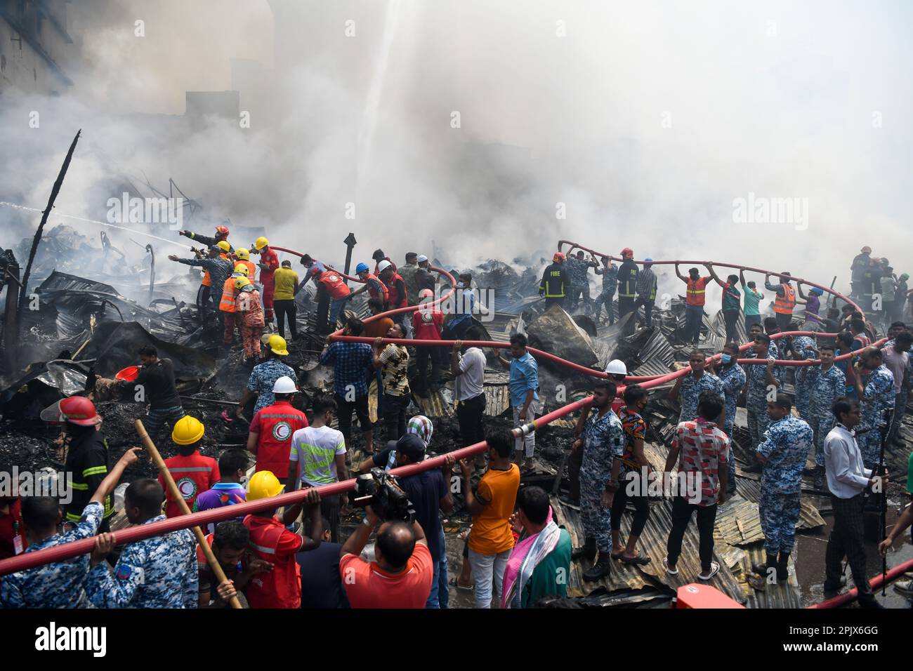 Dhaka, Bangladesh. 04th Apr, 2023. Firefighters, rescue workers, local ...
