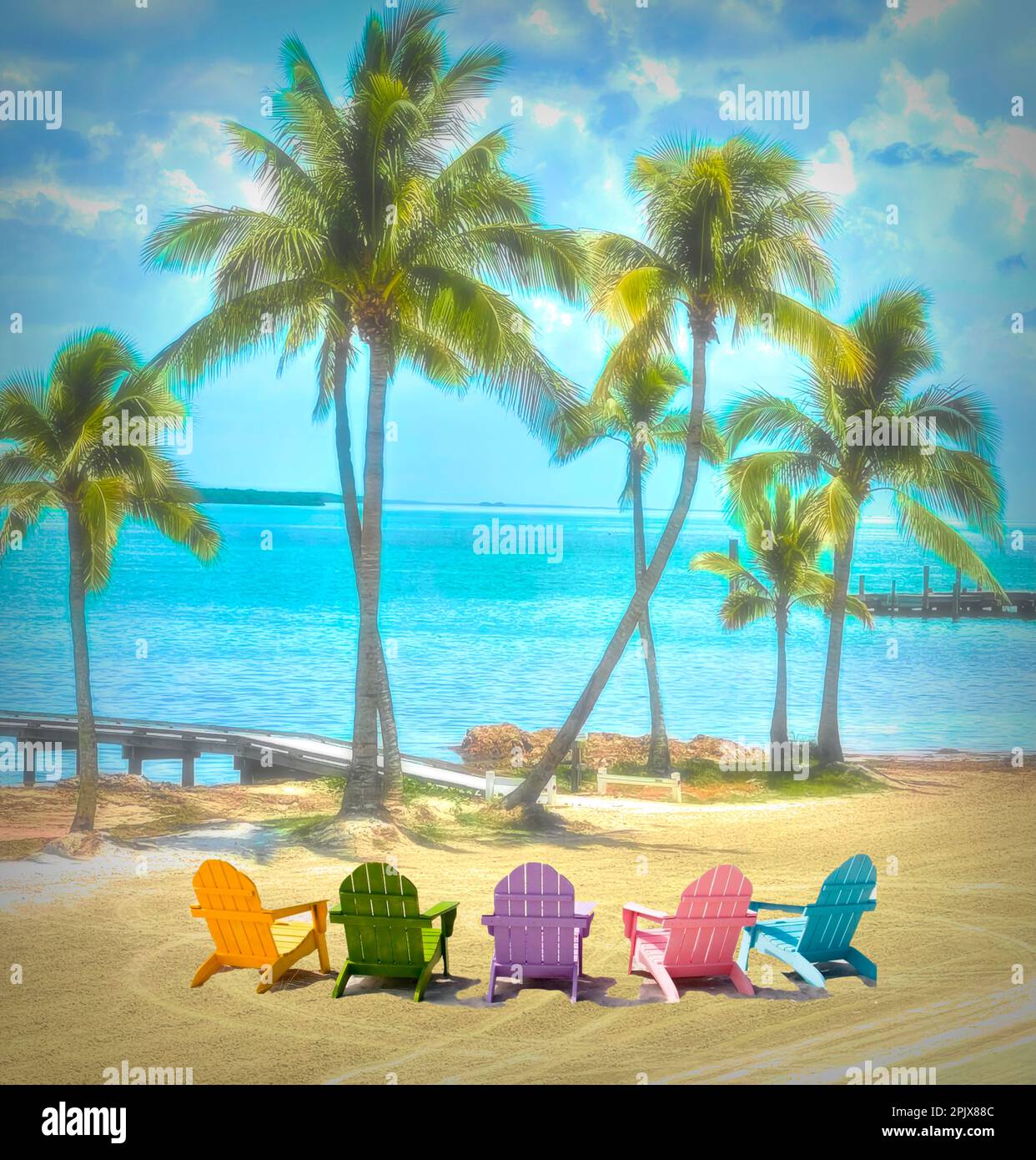 Palm trees and adirondack chairs on an island beach Stock Photo - Alamy