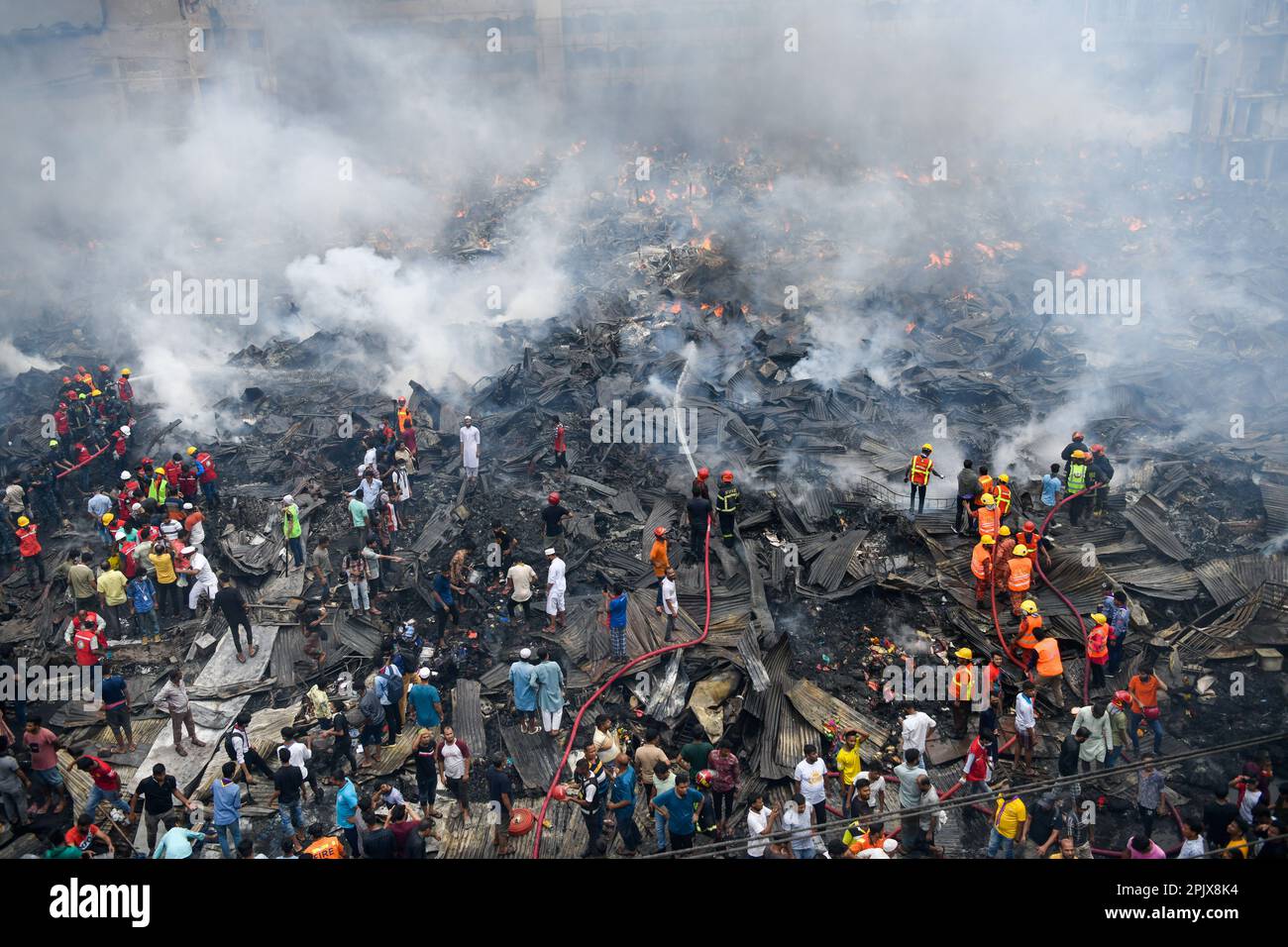 (EDITOR'S NOTE: Image taken with a drone)Aerial view of firefighters ...