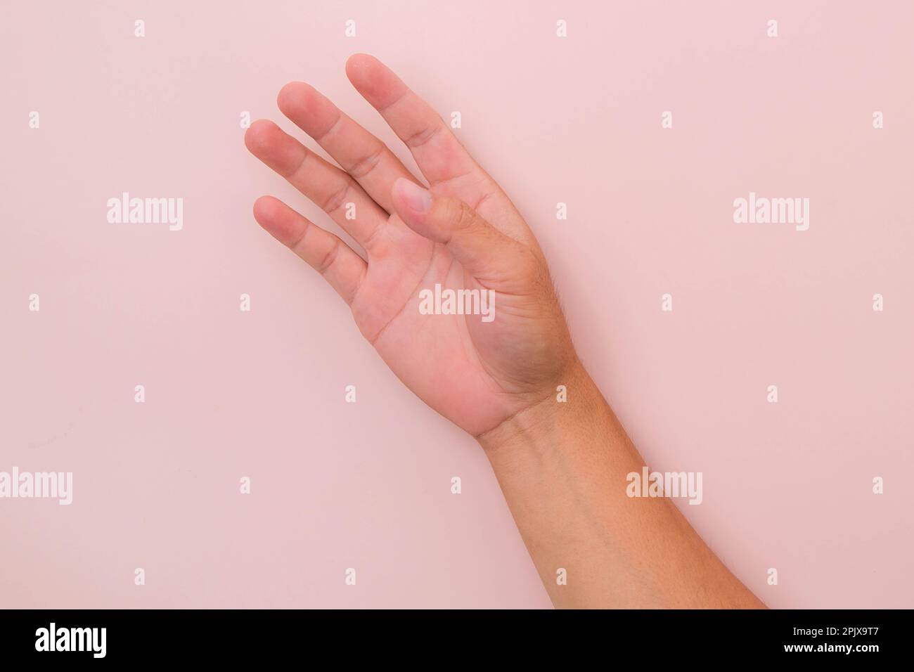 Close up of male hand reaching out ready to help or receive isolated on ...