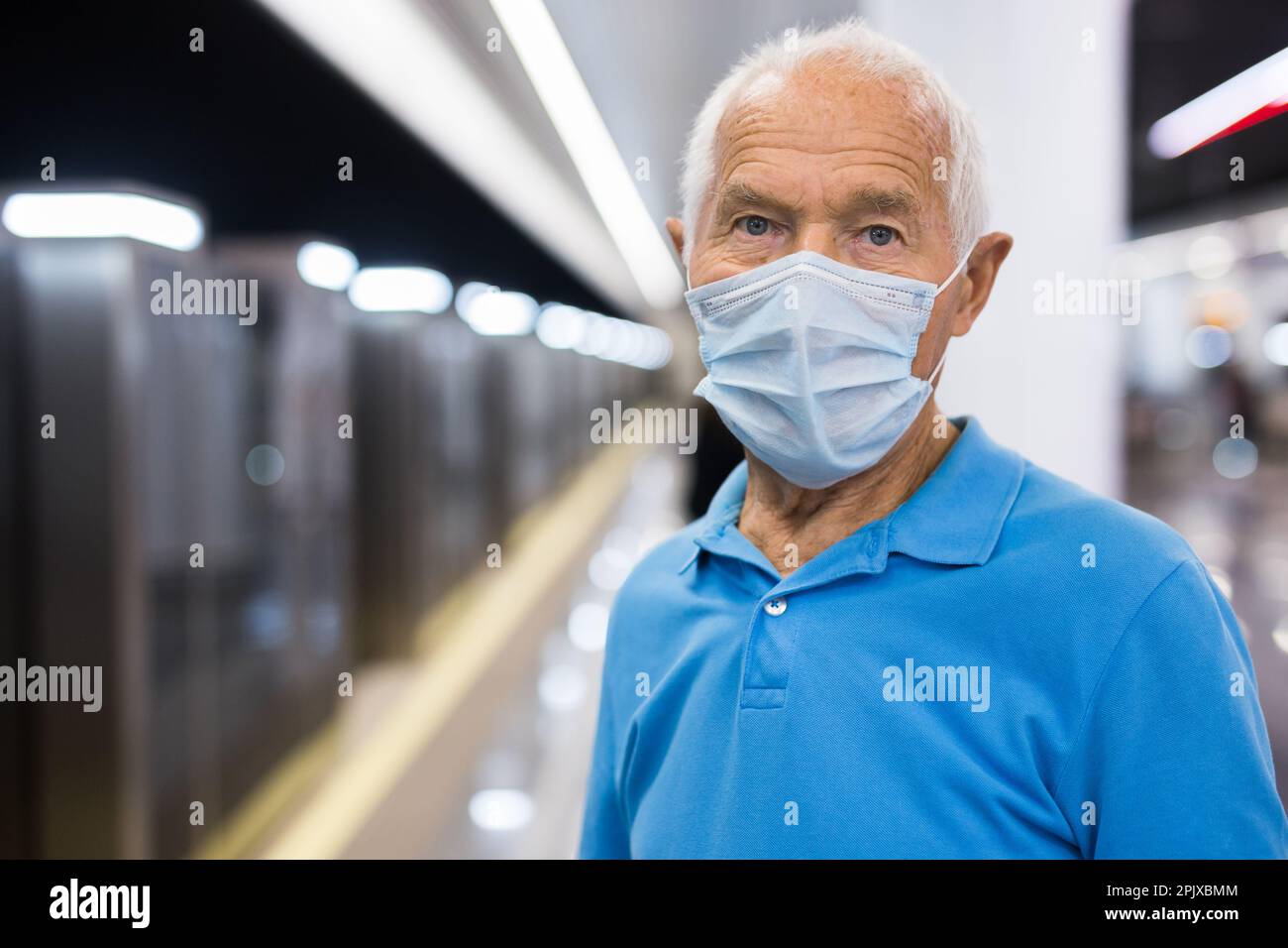 Old man in subway station Stock Photo - Alamy