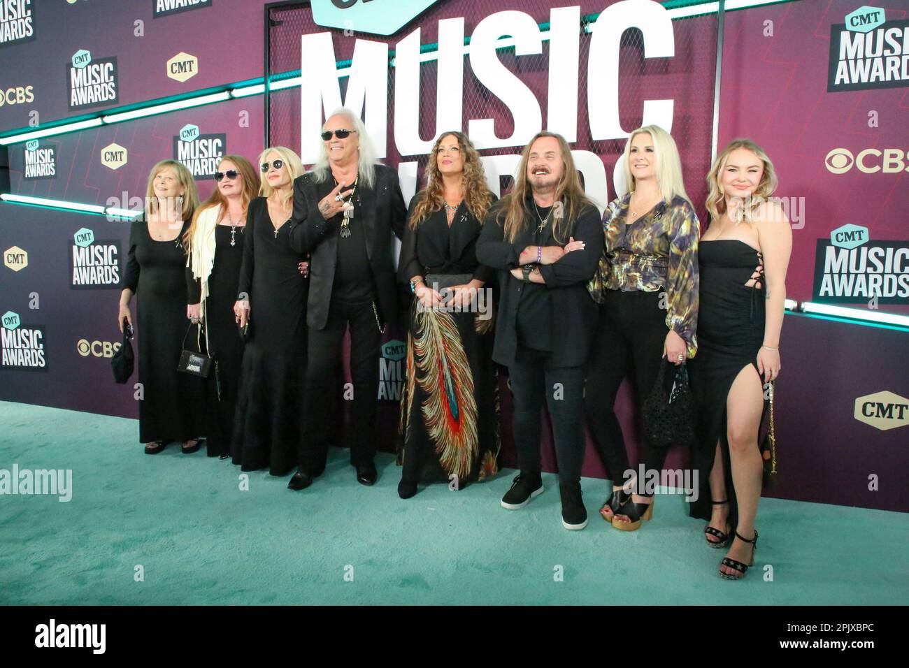 Rickey Medlocke, Johnny Van Zant, and Lisa Van Zant attend the 2023 CMT ...