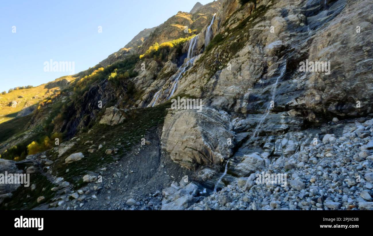 pretty mountain high land fast water cascade at summertime day - photo ...