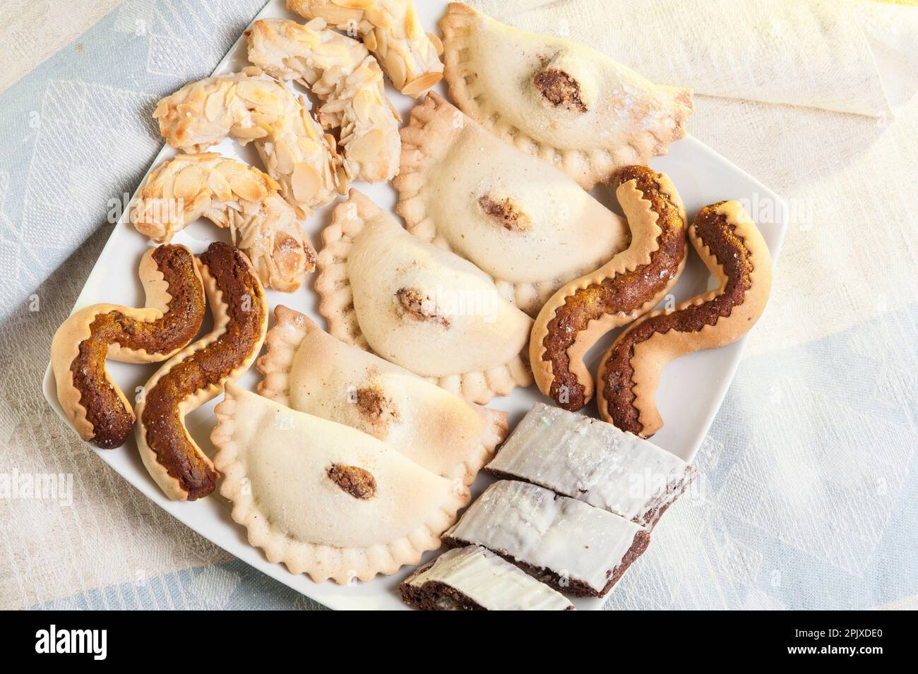 Typical Modican sweets (impannatigghi, sweet savoy, almond fillets ...