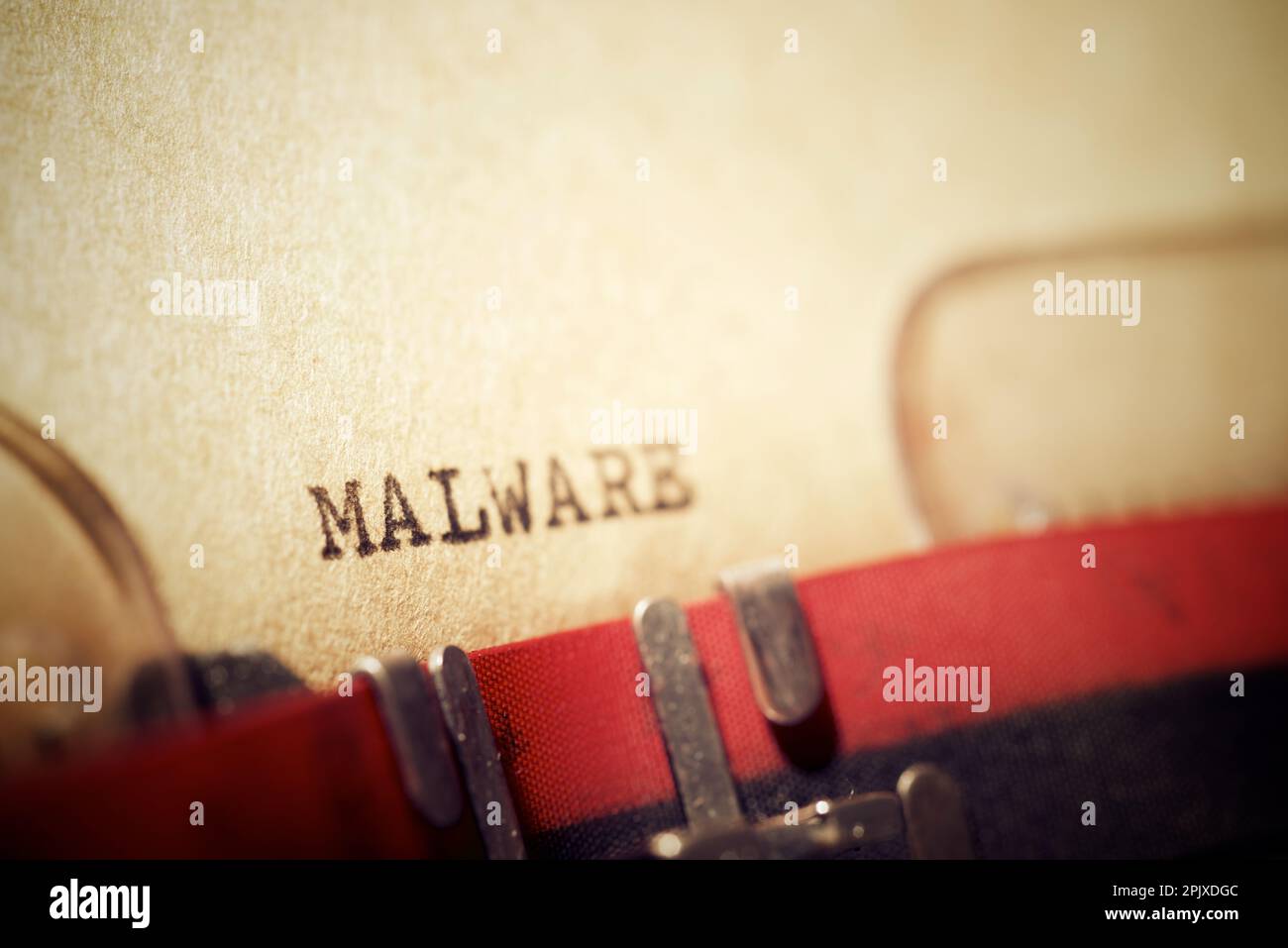 Malware word written with a typewriter Stock Photo - Alamy
