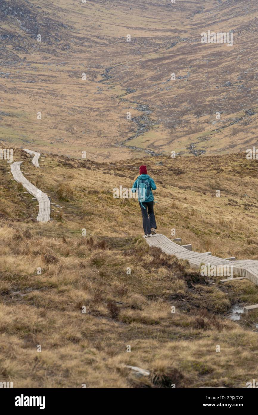 A beautiful shot of a hiker on the trail of the Sugar Loaf Mountain in ...