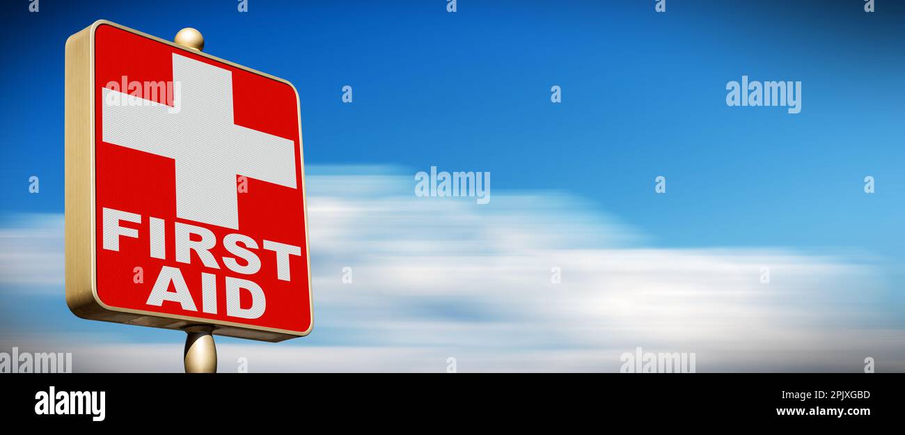 Close-up of a modern red and white First Aid Sign against a clear blue ...
