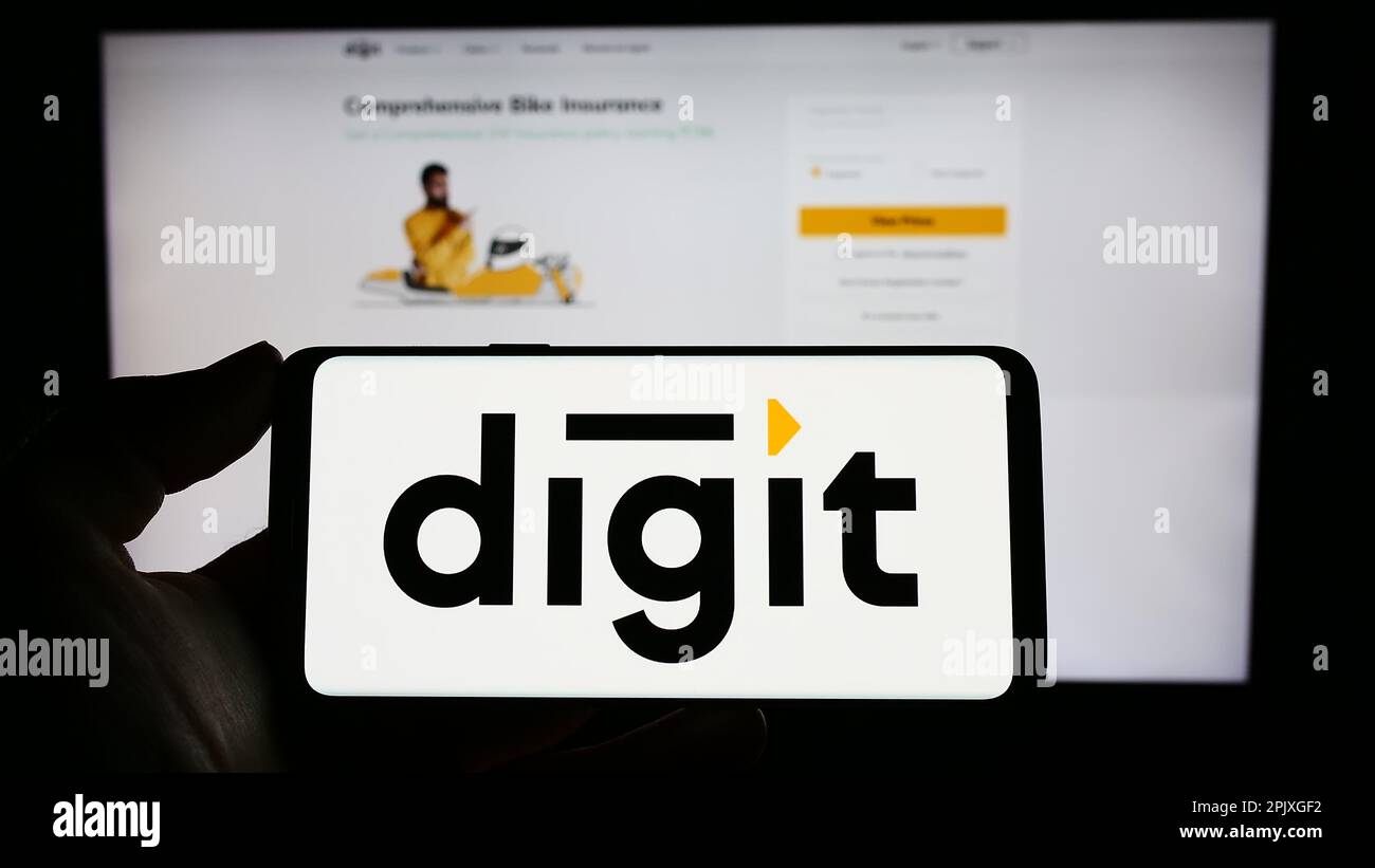 Person holding cellphone with logo of company Go Digit General ...