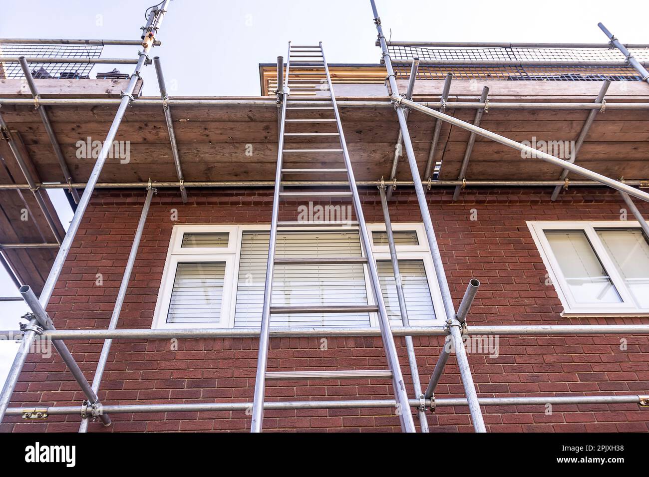 Scaffolding for Roof Repair with Ladder Stock Photo - Alamy