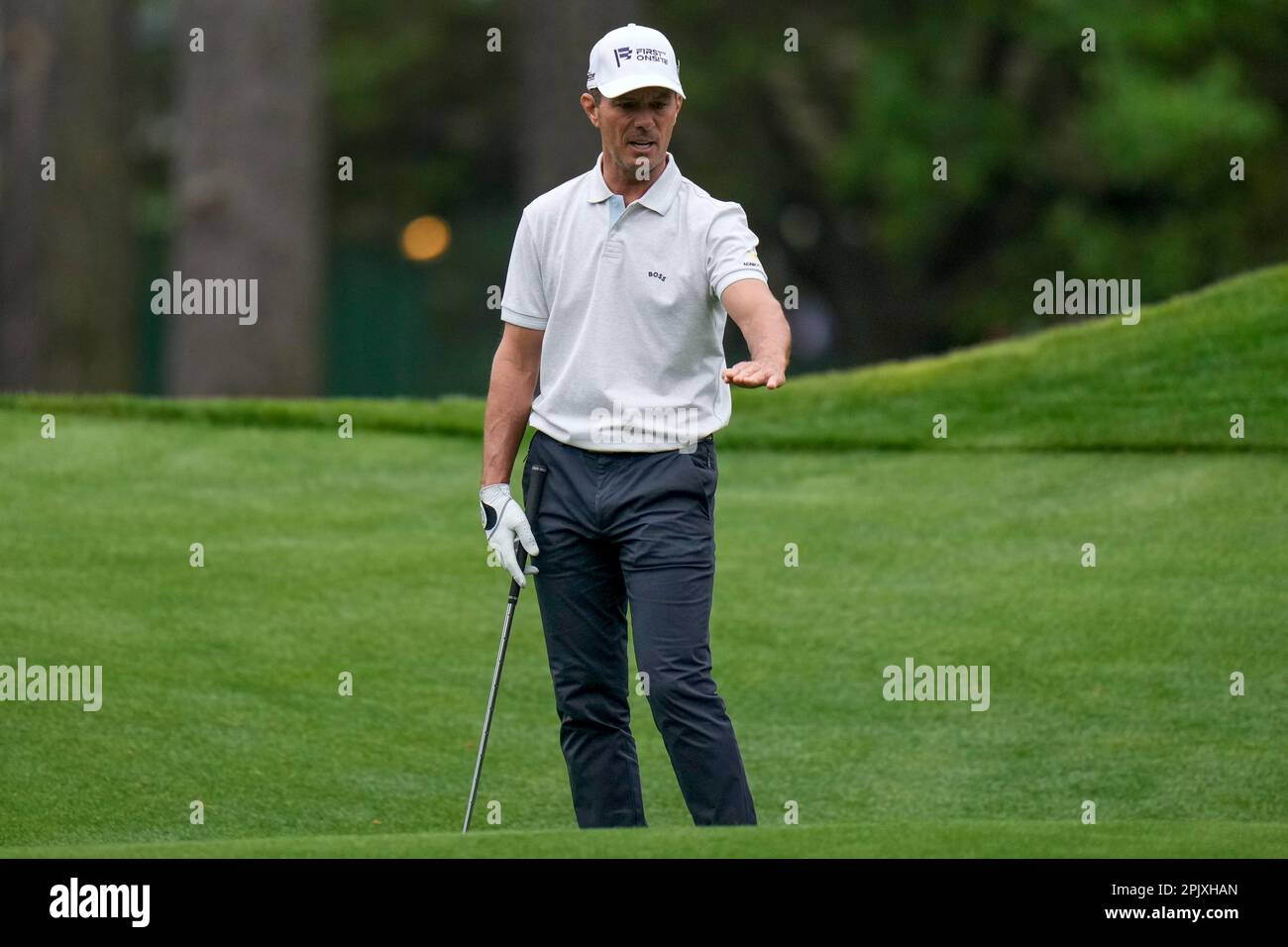 Mike Weir, of Canada, stands on the third fairway during a practice for ...