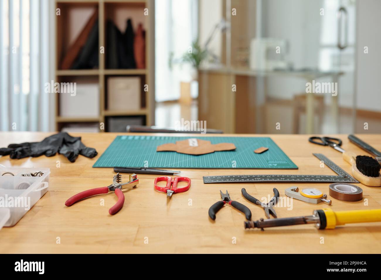 Work tools for making good out of leather Stock Photo - Alamy