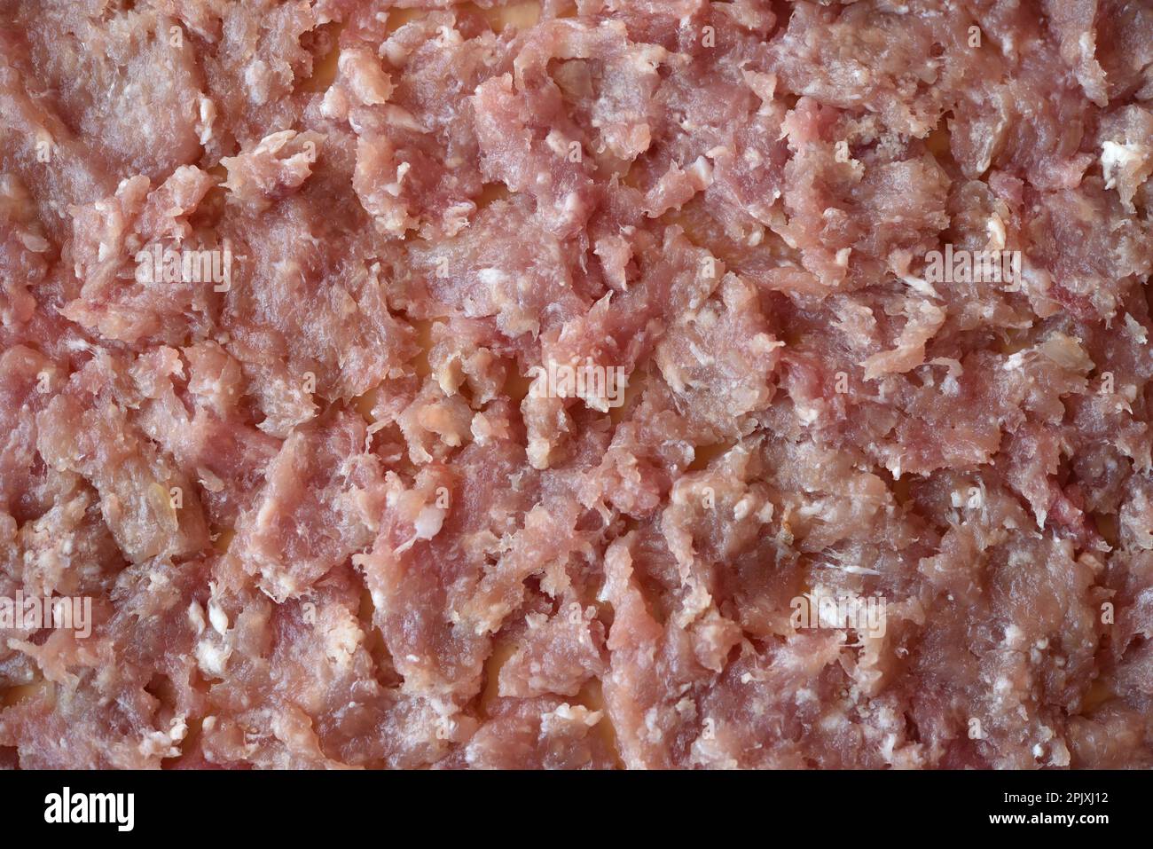 Background of meat in a pie. Minced meat close-up. Fresh meat. Raw ...
