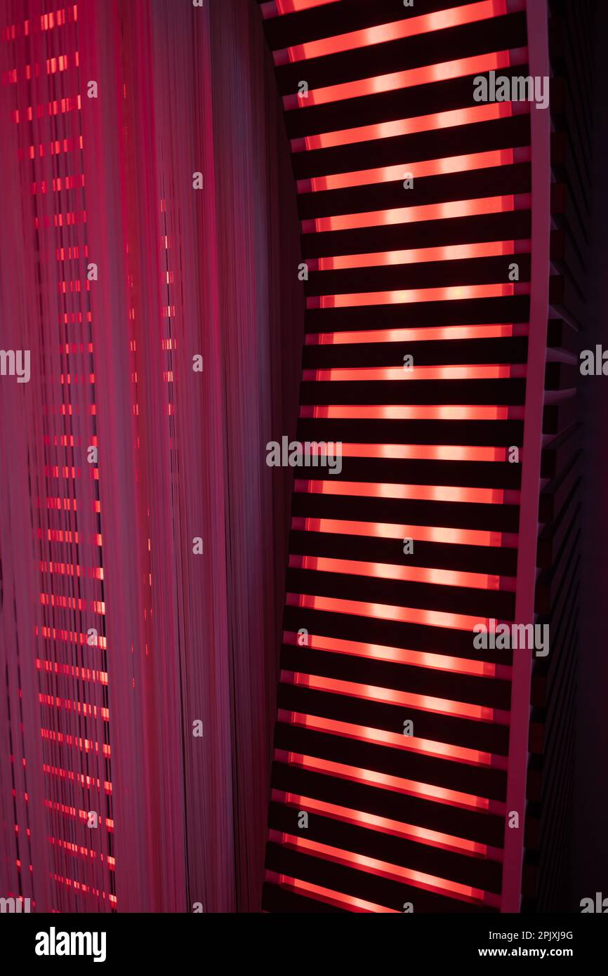 Illuminated Red Stripes on a Modern Column in Switzerland Stock Photo ...