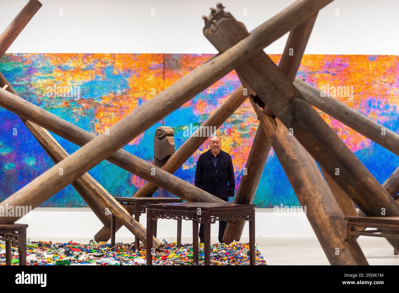 London, UK. 4 April 2023. Ai Weiwei in front of 'Water Lilies #1', 2022 ...
