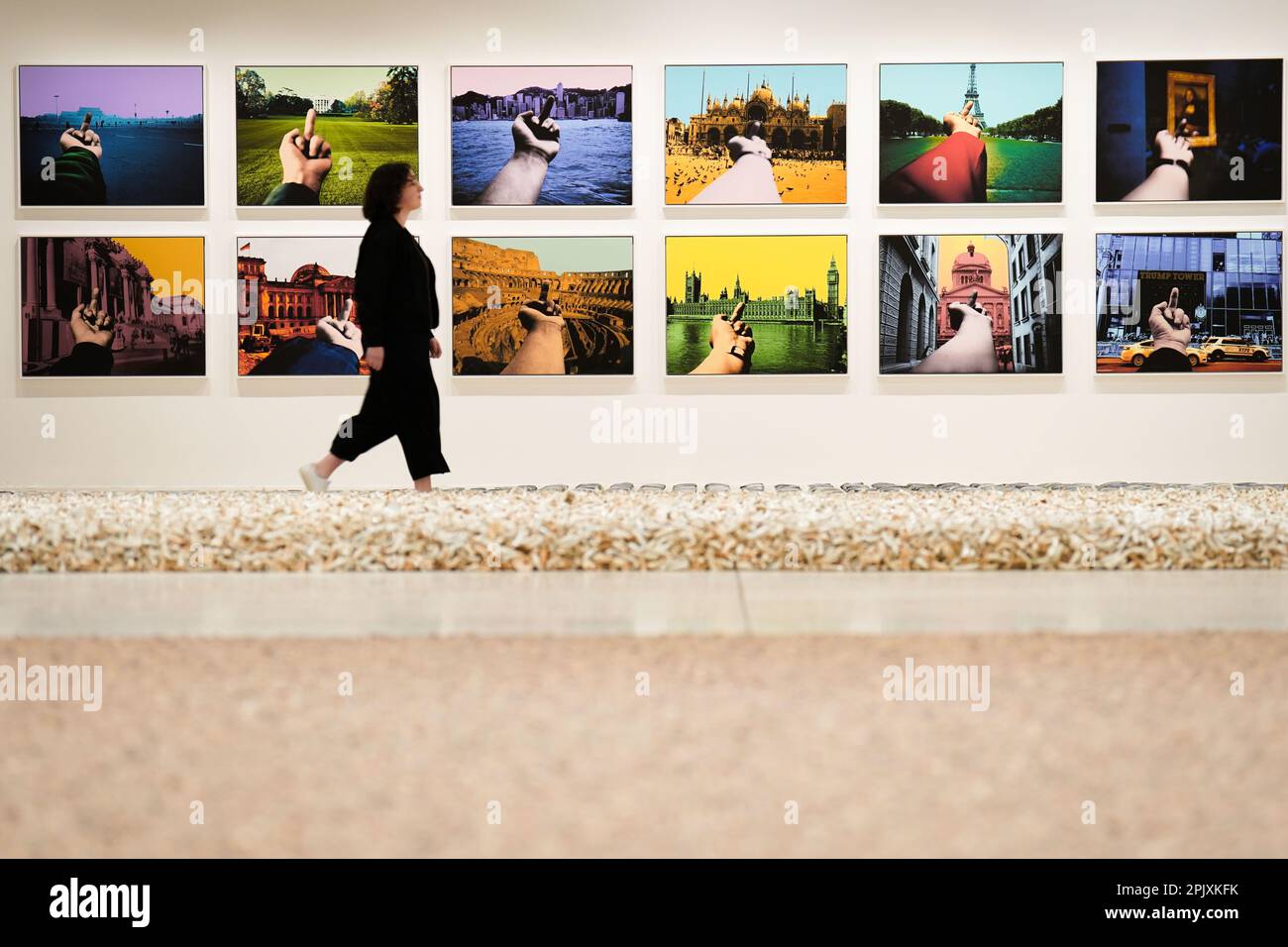A model walks past Ai Weiwei's, Study of Perspective during a photo ...