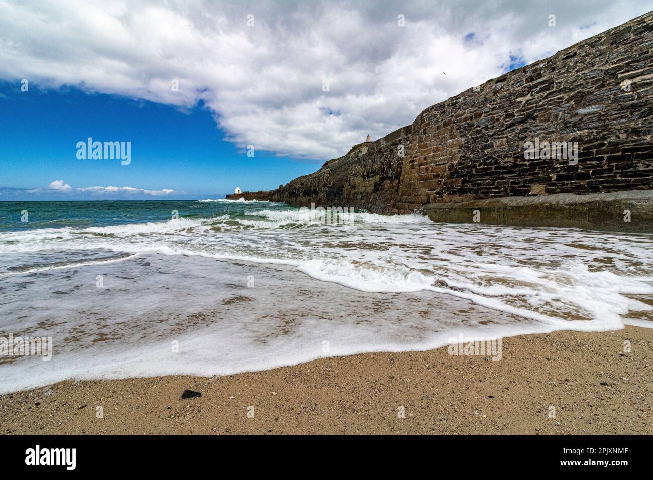 Sea View of Waves, Beach and Harbour Wall with Look Out Hut and ...