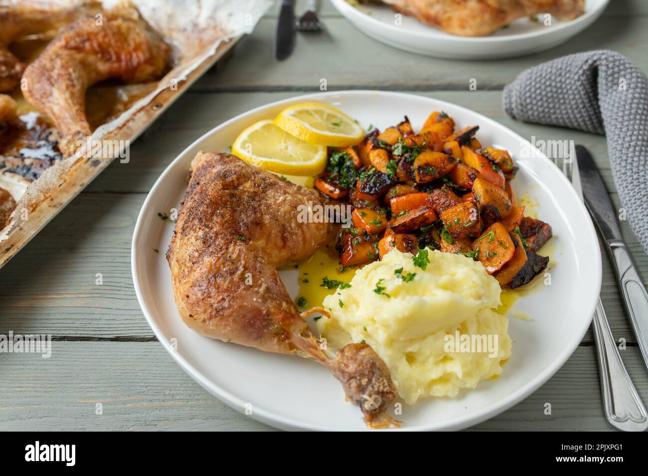 Oven baked chicken leg with marinated pumpkin salad and mashed potatoes ...
