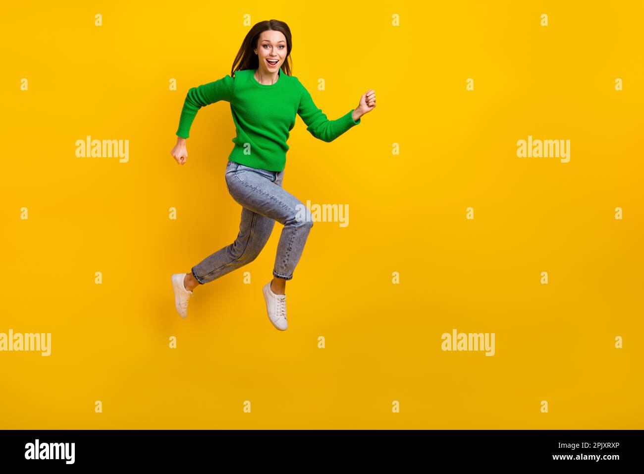 Full length photo of overjoyed cheerful person jumping rush empty space ...