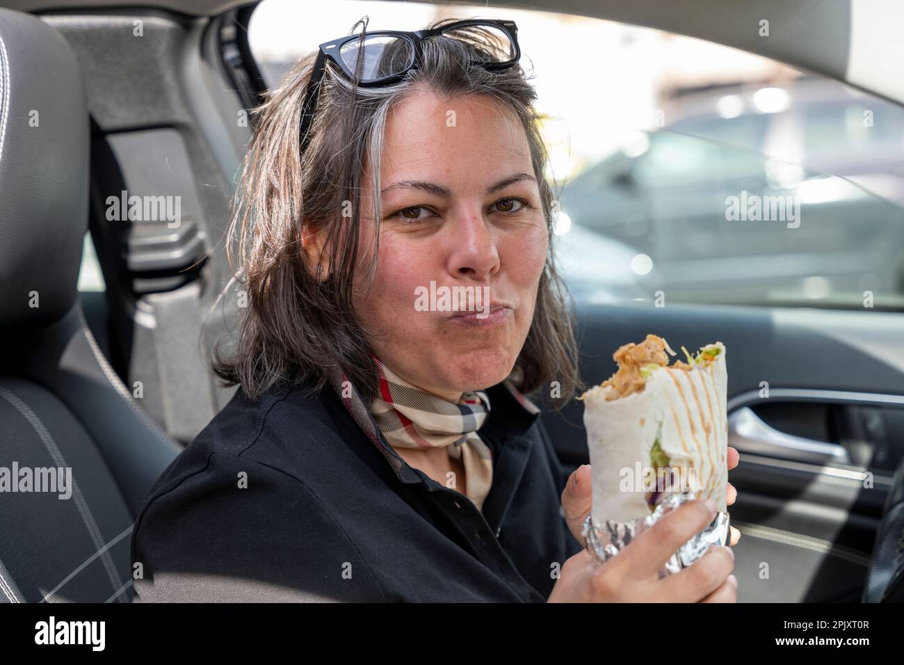 Adult person eating car hi-res stock photography and images - Alamy