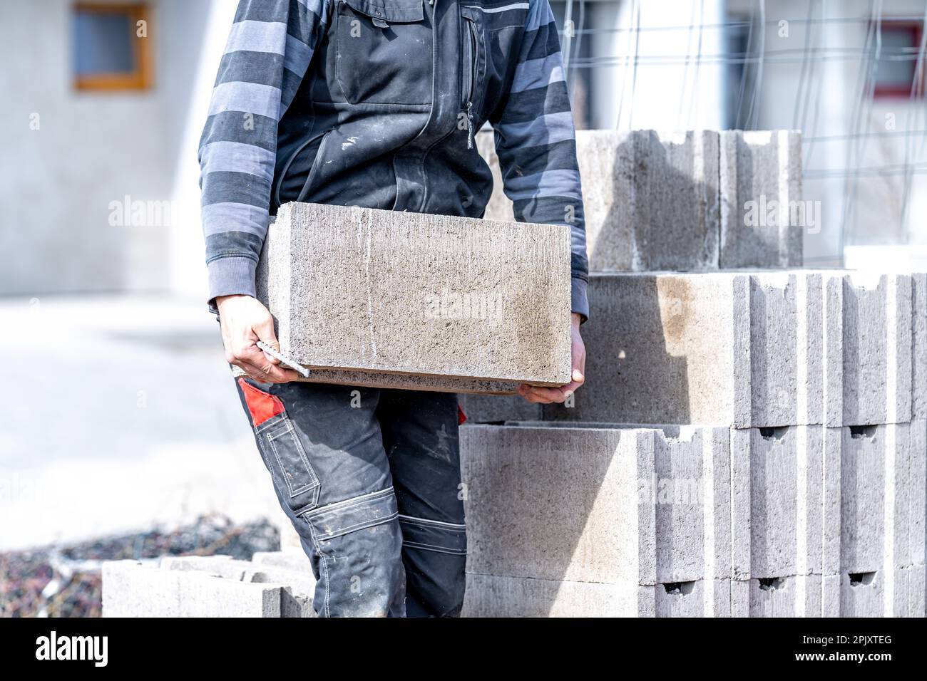 construction of a building made of concrete bricks Stock Photo - Alamy