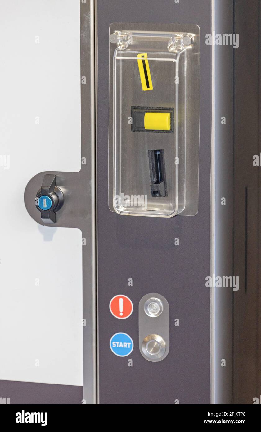 Coin Operated Machine With Weather Protection Cover and Start Button ...