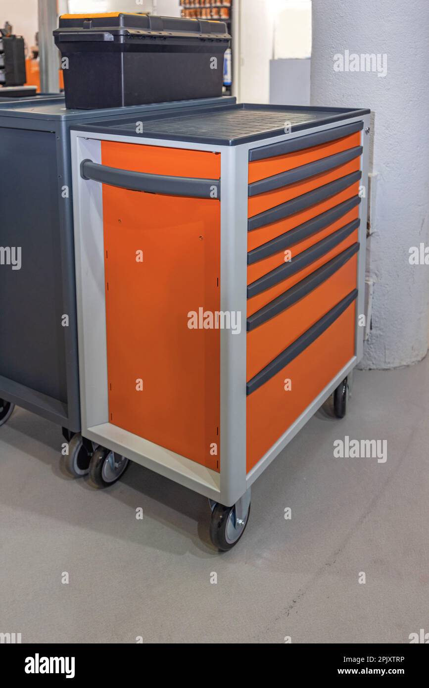 Wheeled Tool Cart With Drawers in Garage Workshop Stock Photo - Alamy