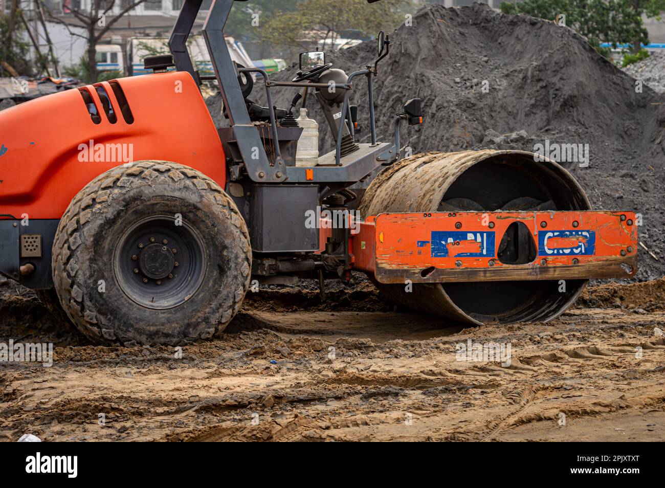 Road Repairing roller compactor car at work . Roadways Construction ...