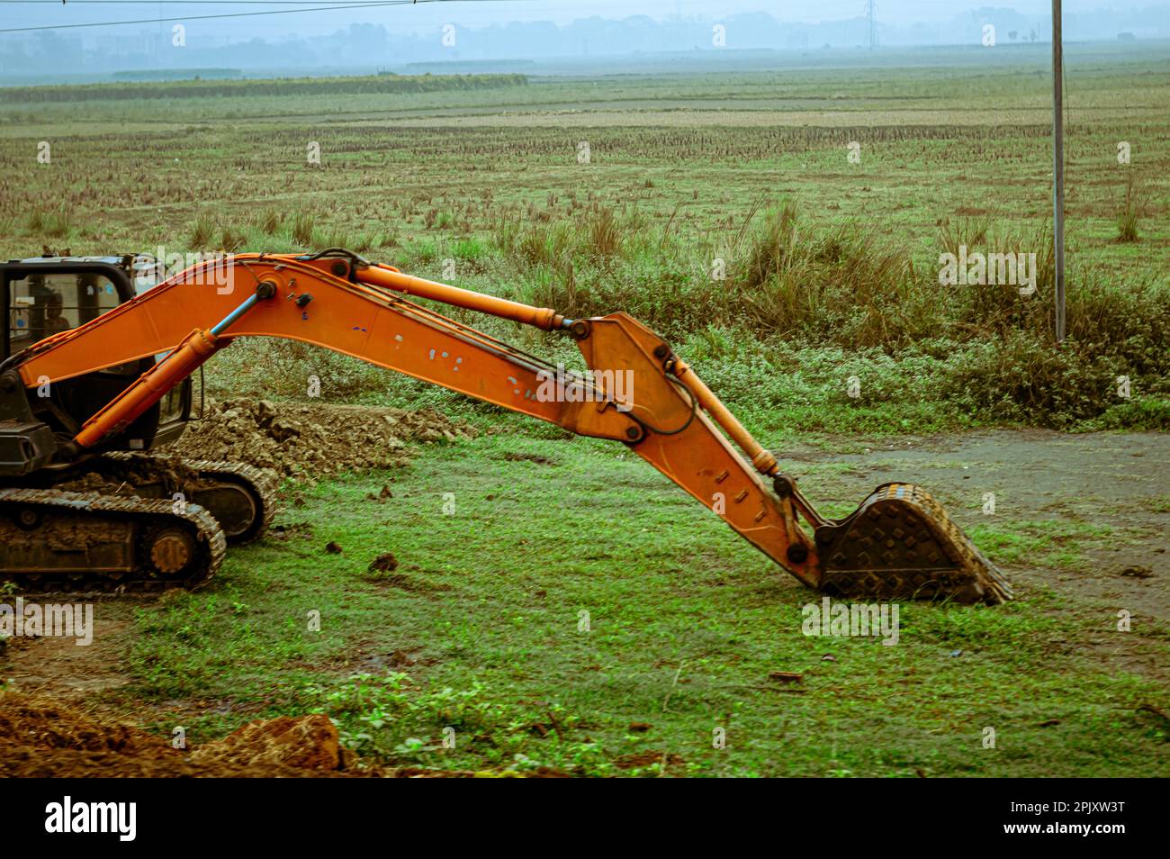 A backhoe loader excavator digger, a heavy industrial vehicle on a ...