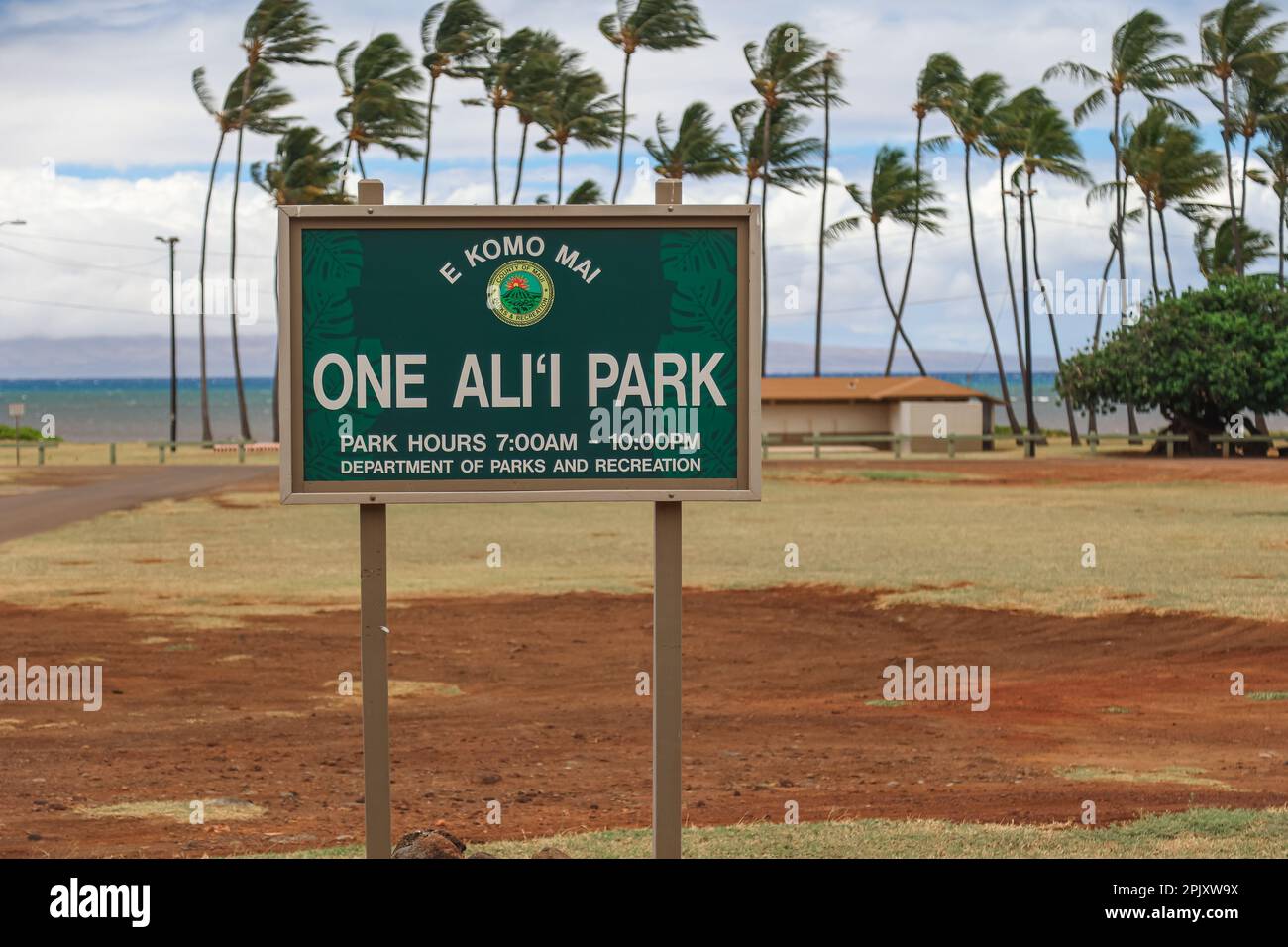A sign marks One Ali'i Park, a popular public beach park and campground ...