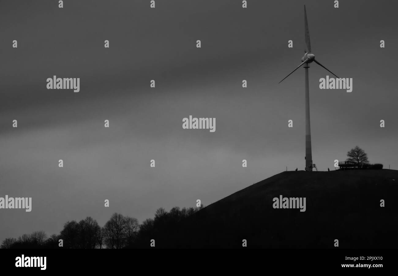 A big windmill on a hill Stock Photo - Alamy