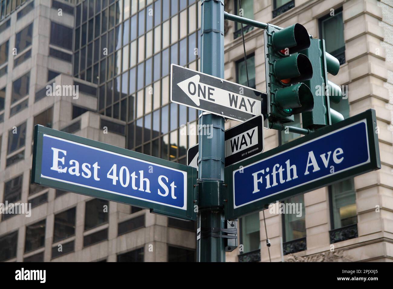 Blue East 40th Street and Fifth Avenue historic sign in midtown ...