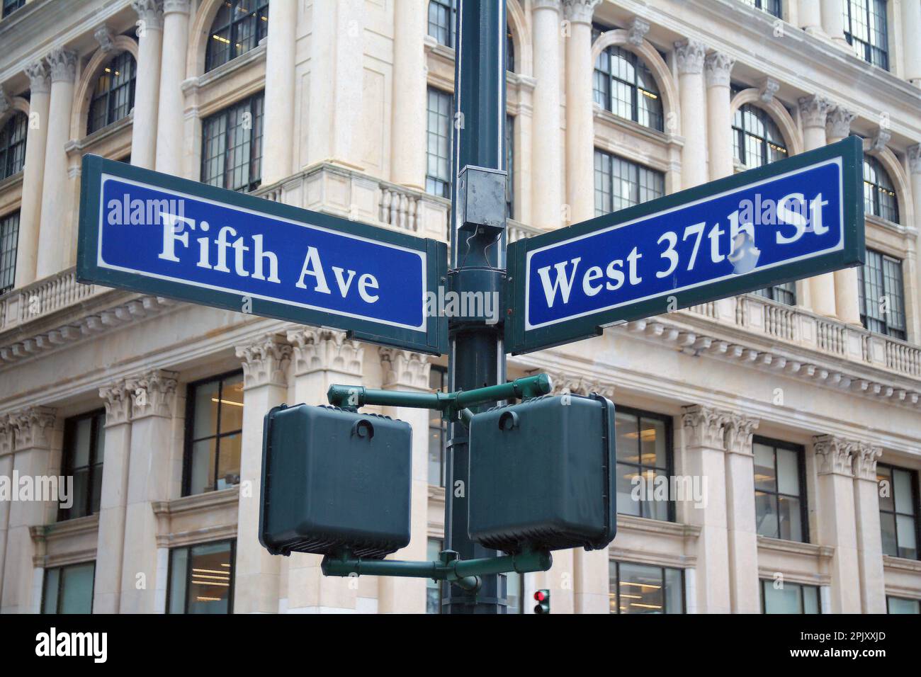 Blue West 37th Street and Fifth Avenue historic sign in midtown ...