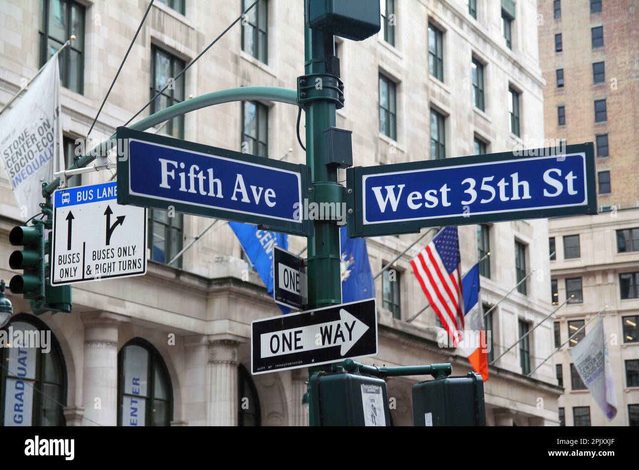 Blue West 35th Street and Fifth Avenue historic sign in midtown ...