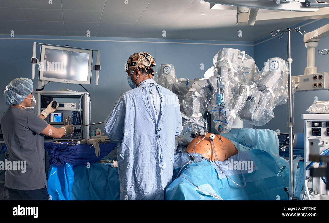 Surgical system with minimally invasive robot in a hospital. Robotic ...